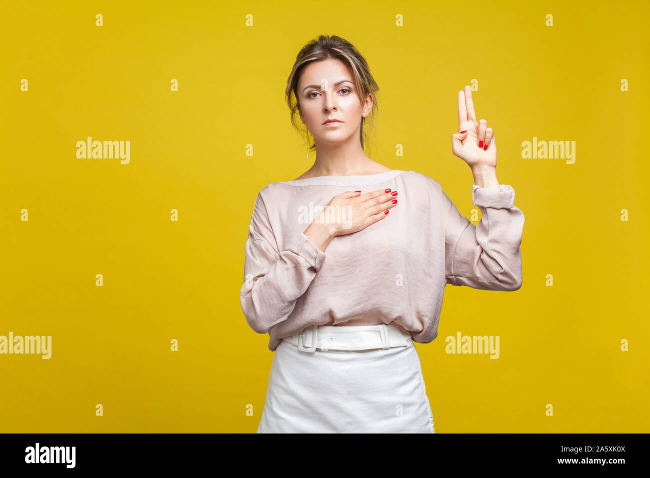 Raised hand swearing allegiance hi-res stock photography and images - Alamy