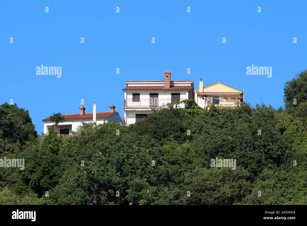 Barely visible houses hi-res stock photography and images - Alamy