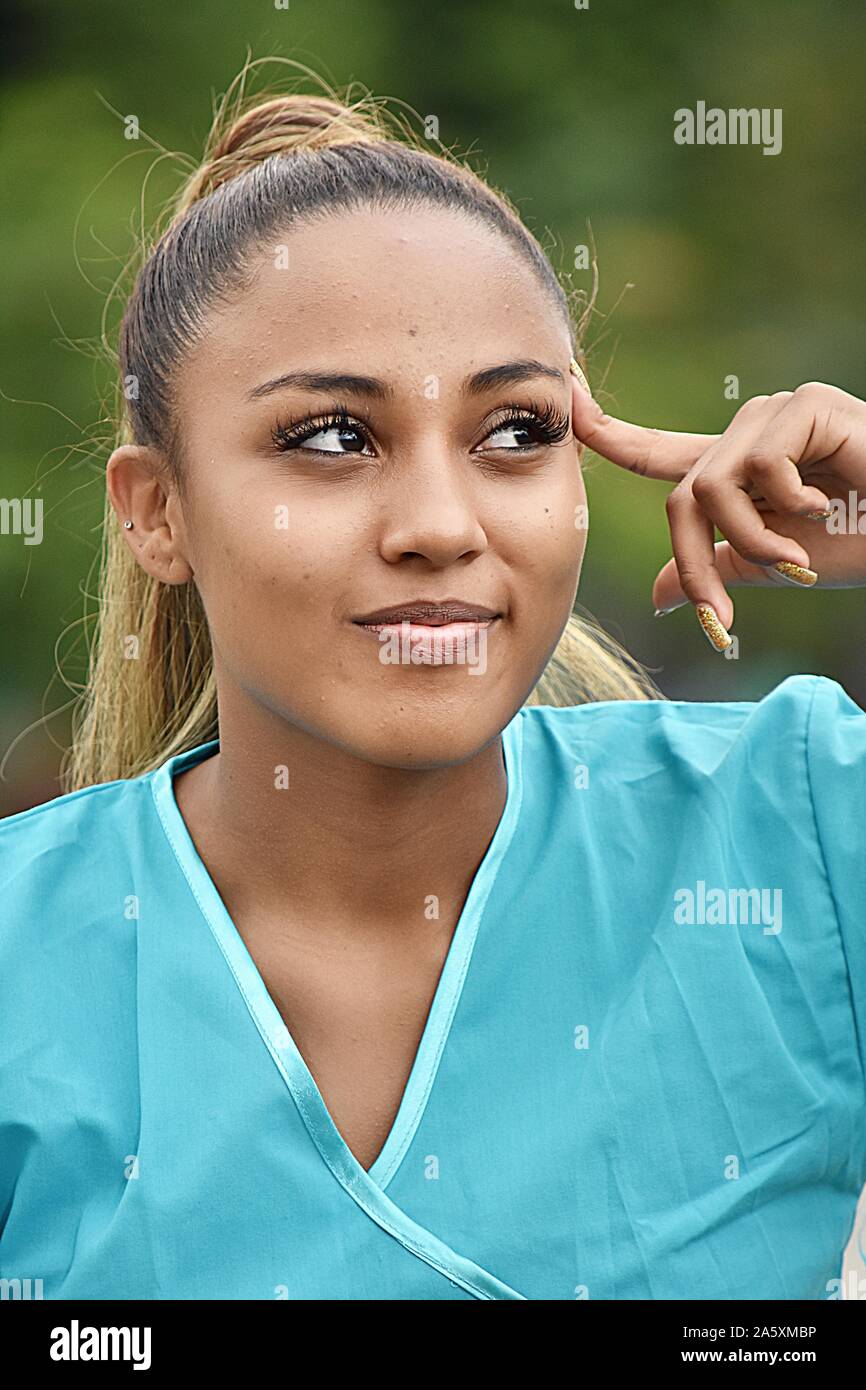 Thoughtful Hispanic Female Nurse Stock Photo - Alamy
