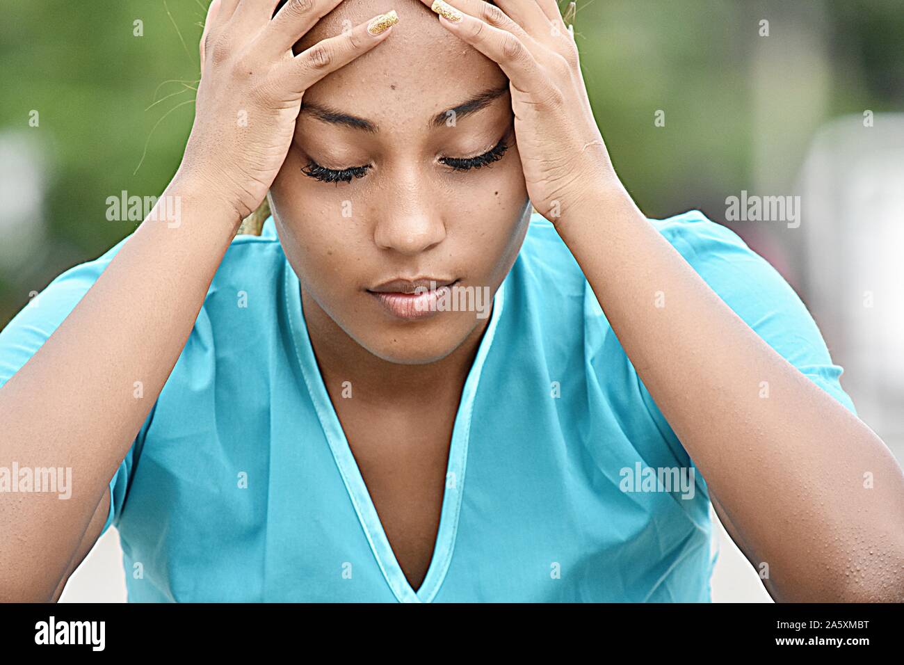 Hispanic Female Nurse And Stress Stock Photo - Alamy