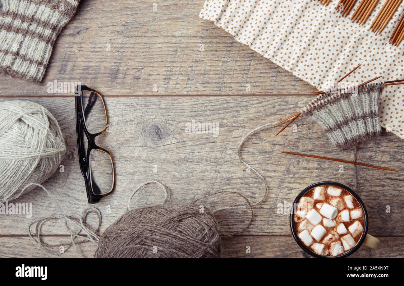The process of knitting sock with circular bamboo knitting needles, on ...