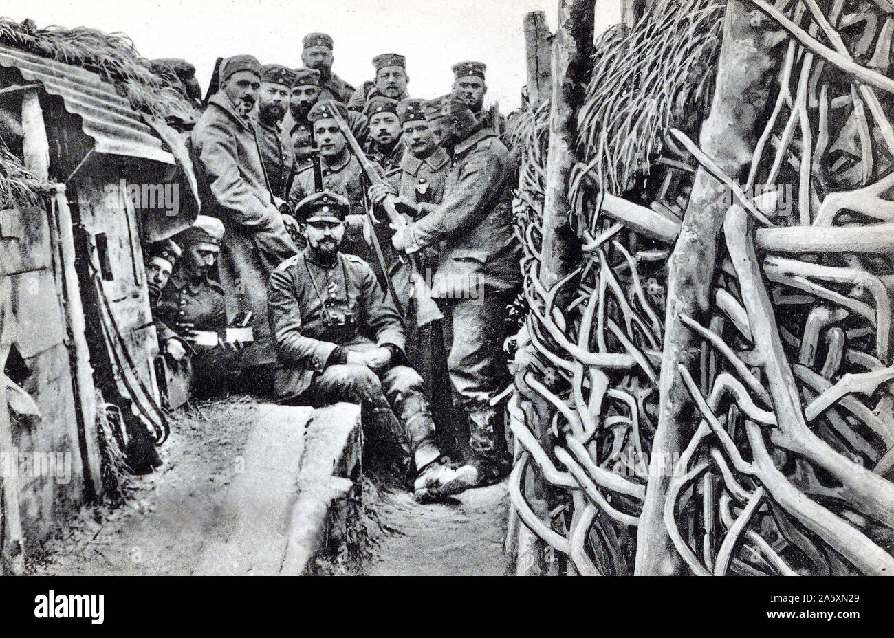 Soldiers in the trenches in front of a dugout. France ca. 1918 Stock ...
