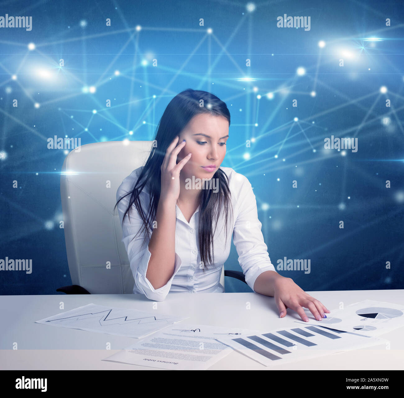 Manager in front of the office desk with networking concept Stock Photo ...