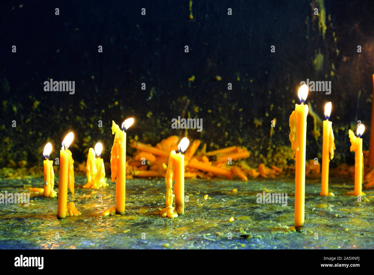 Candle light with background in temple Stock Photo - Alamy