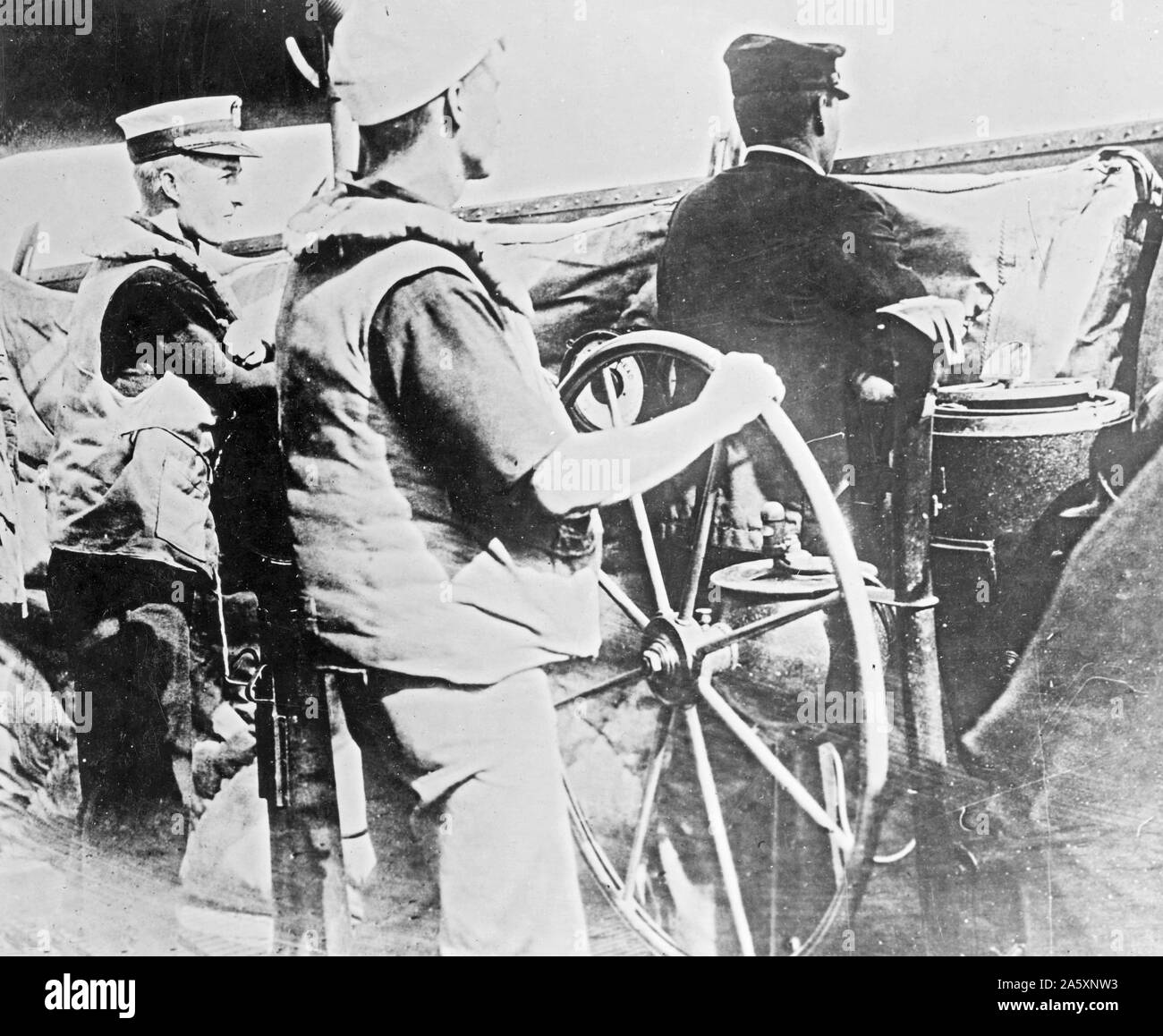 On board a ship showing man at wheel ca. 1917-1919 Stock Photo - Alamy