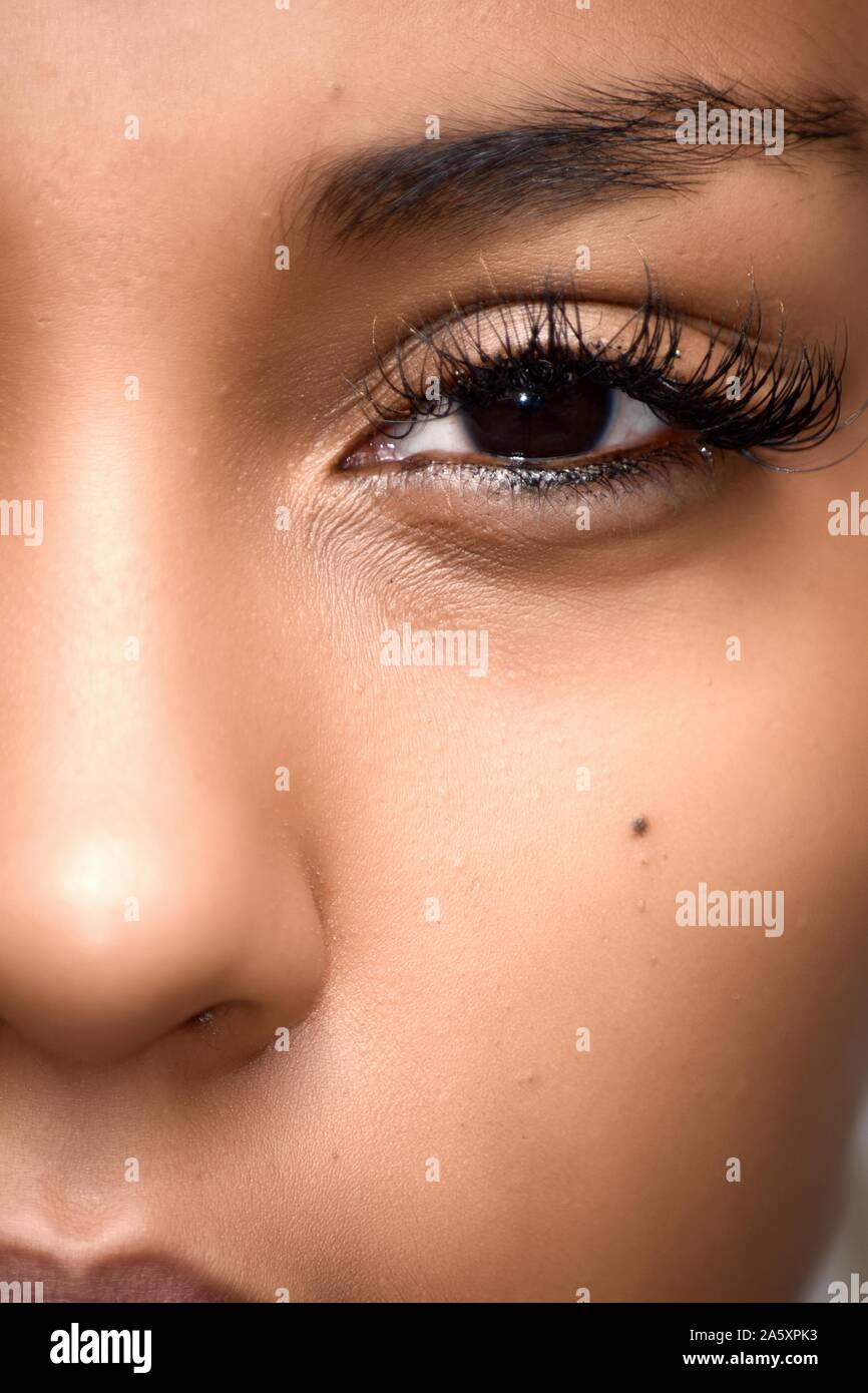Youthful Colombian Female Eyes Stock Photo - Alamy