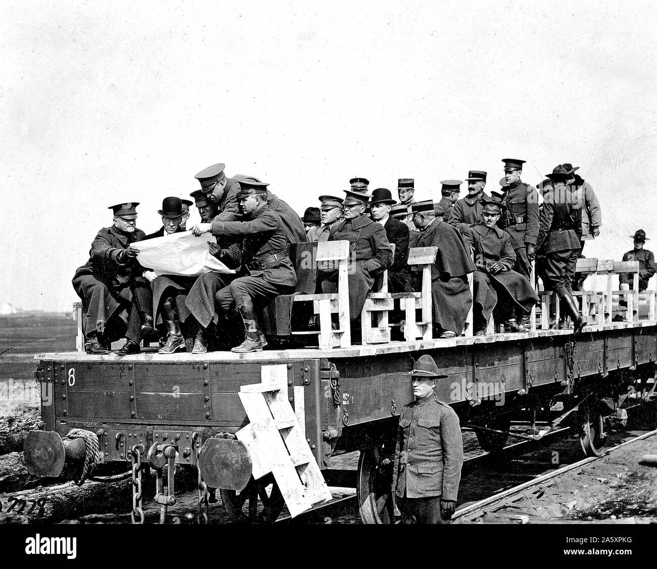 Secretary. Baker, Gen. Pershing and other officers examining a map at ...