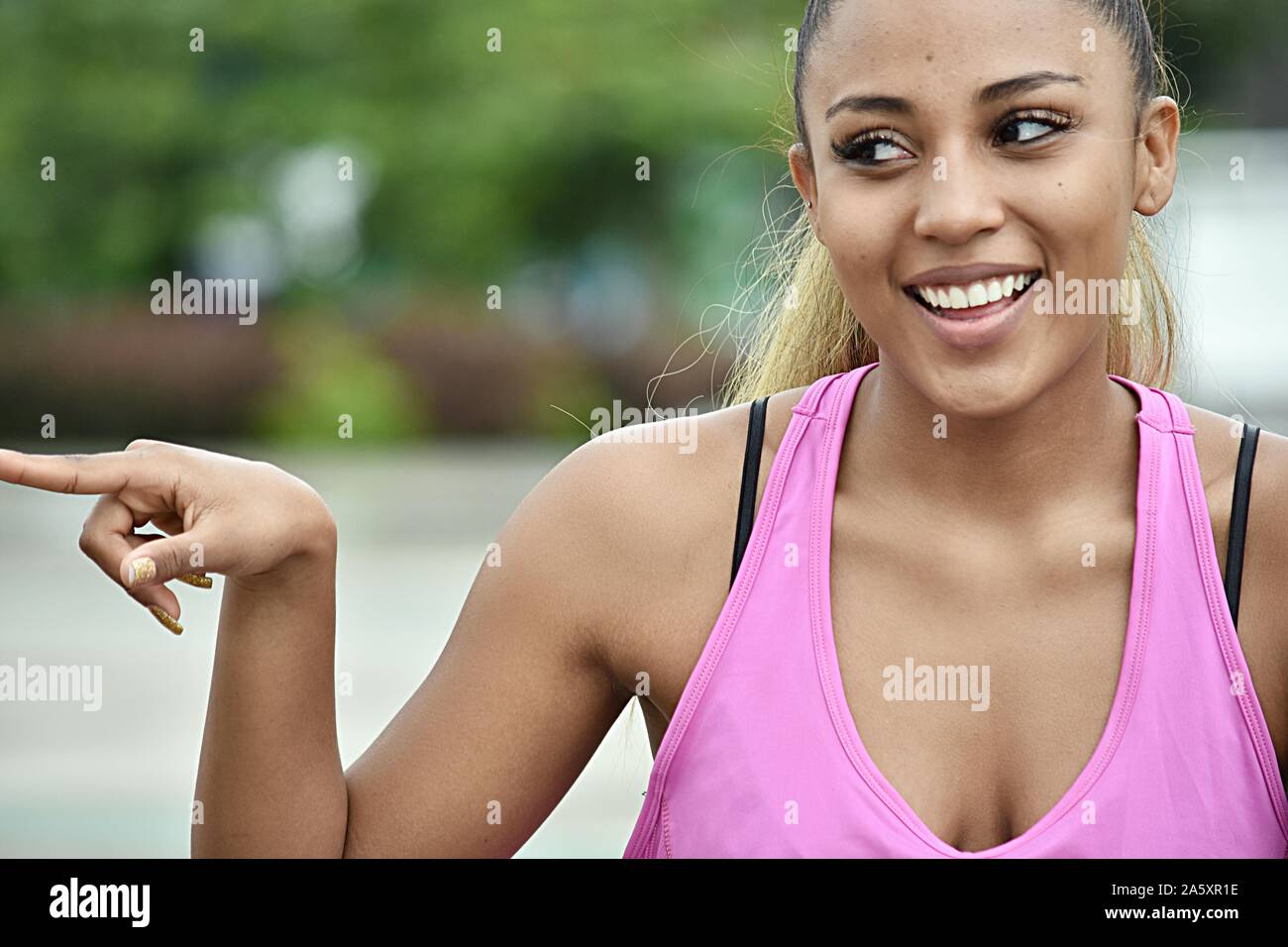Fit Female Pointing Stock Photo - Alamy