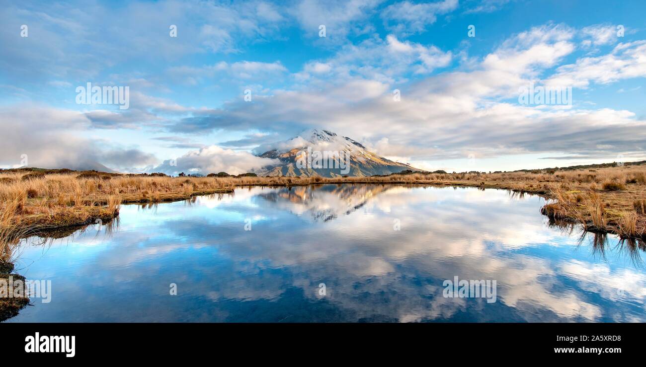Water reflection in Pouakai Tarn, stratovolcano Mount Taranaki or Mount ...