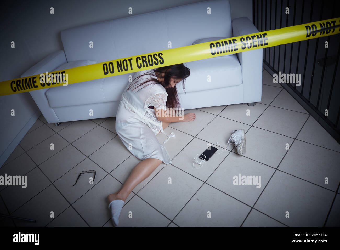 crime scene - woman liyng dead on the sofa Stock Photo - Alamy