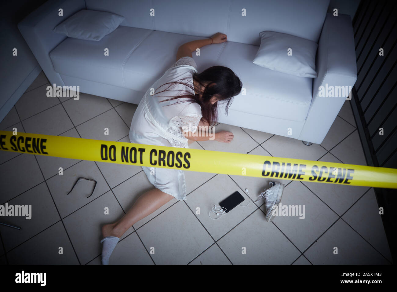 crime scene - woman liyng dead on the sofa Stock Photo - Alamy