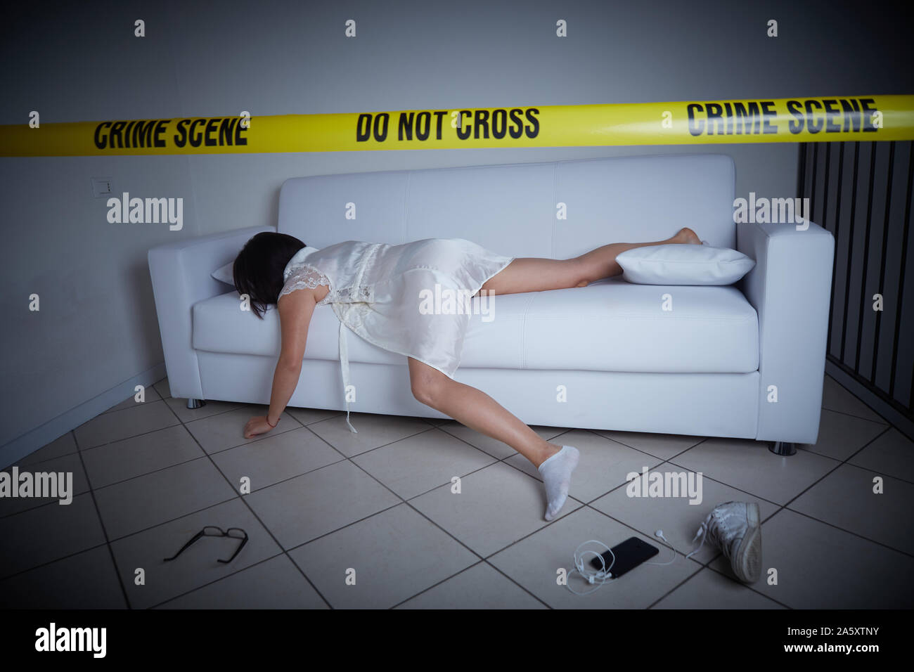 crime scene - woman liyng dead on the sofa Stock Photo - Alamy