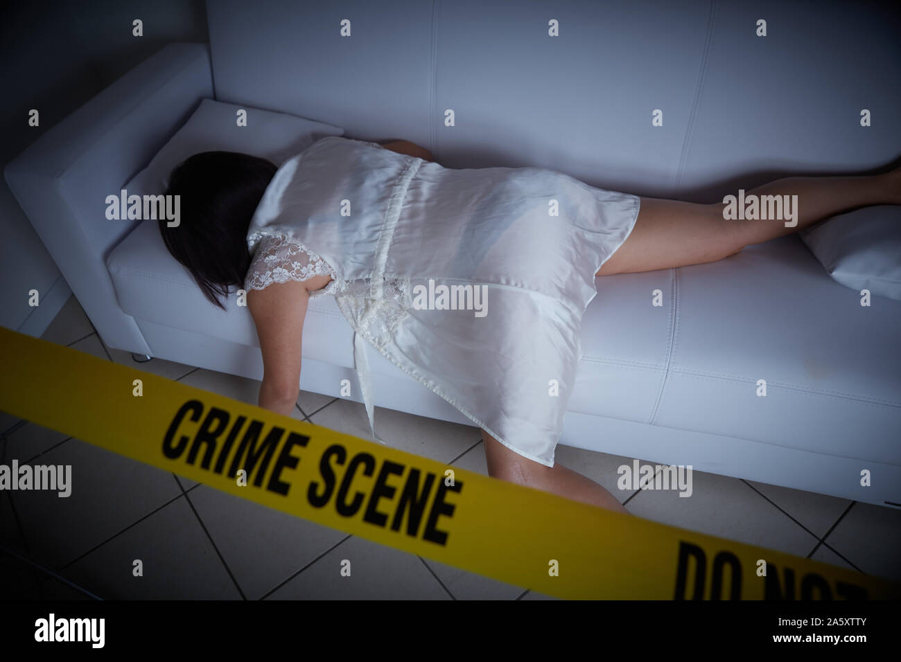 crime scene - woman liyng dead on the sofa Stock Photo - Alamy