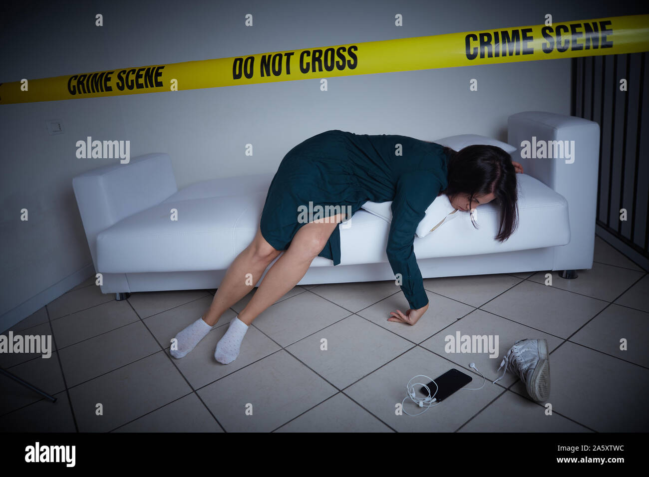 crime scene - woman liyng dead on the sofa Stock Photo - Alamy