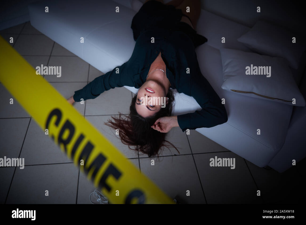 crime scene - woman liyng dead on the sofa Stock Photo - Alamy