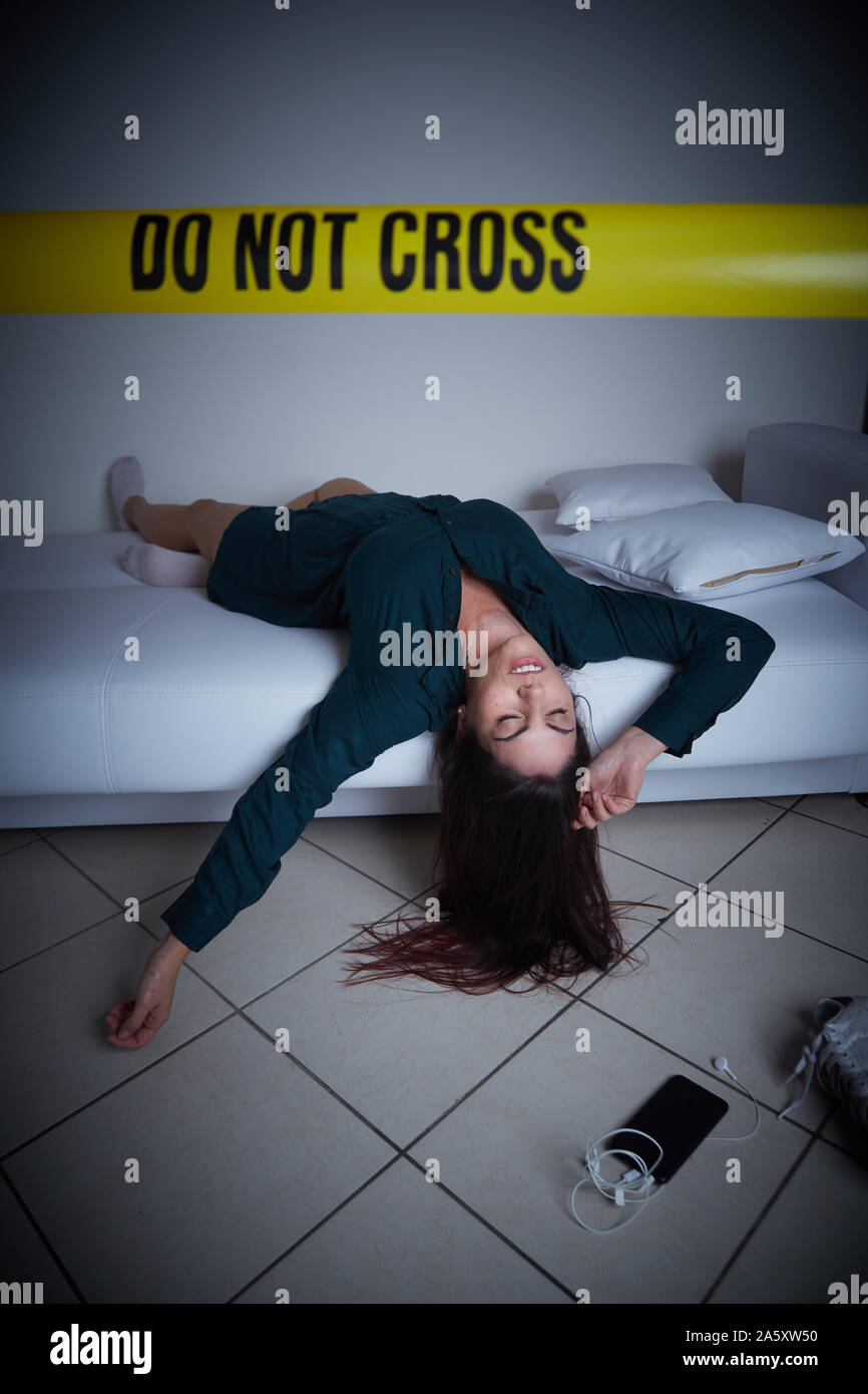 crime scene - woman liyng dead on the sofa Stock Photo - Alamy