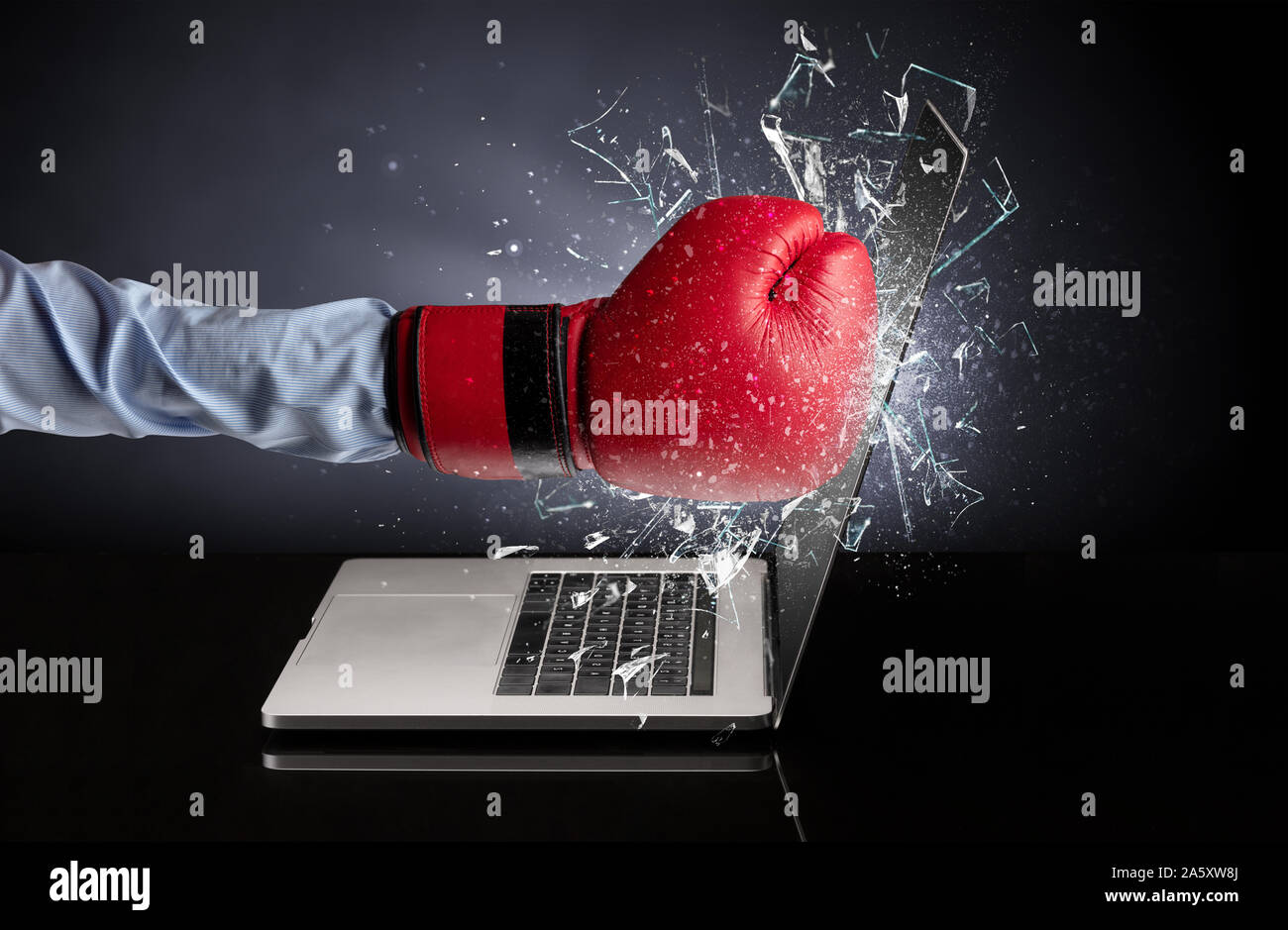Hand hitting strongly laptop screen glass Stock Photo - Alamy