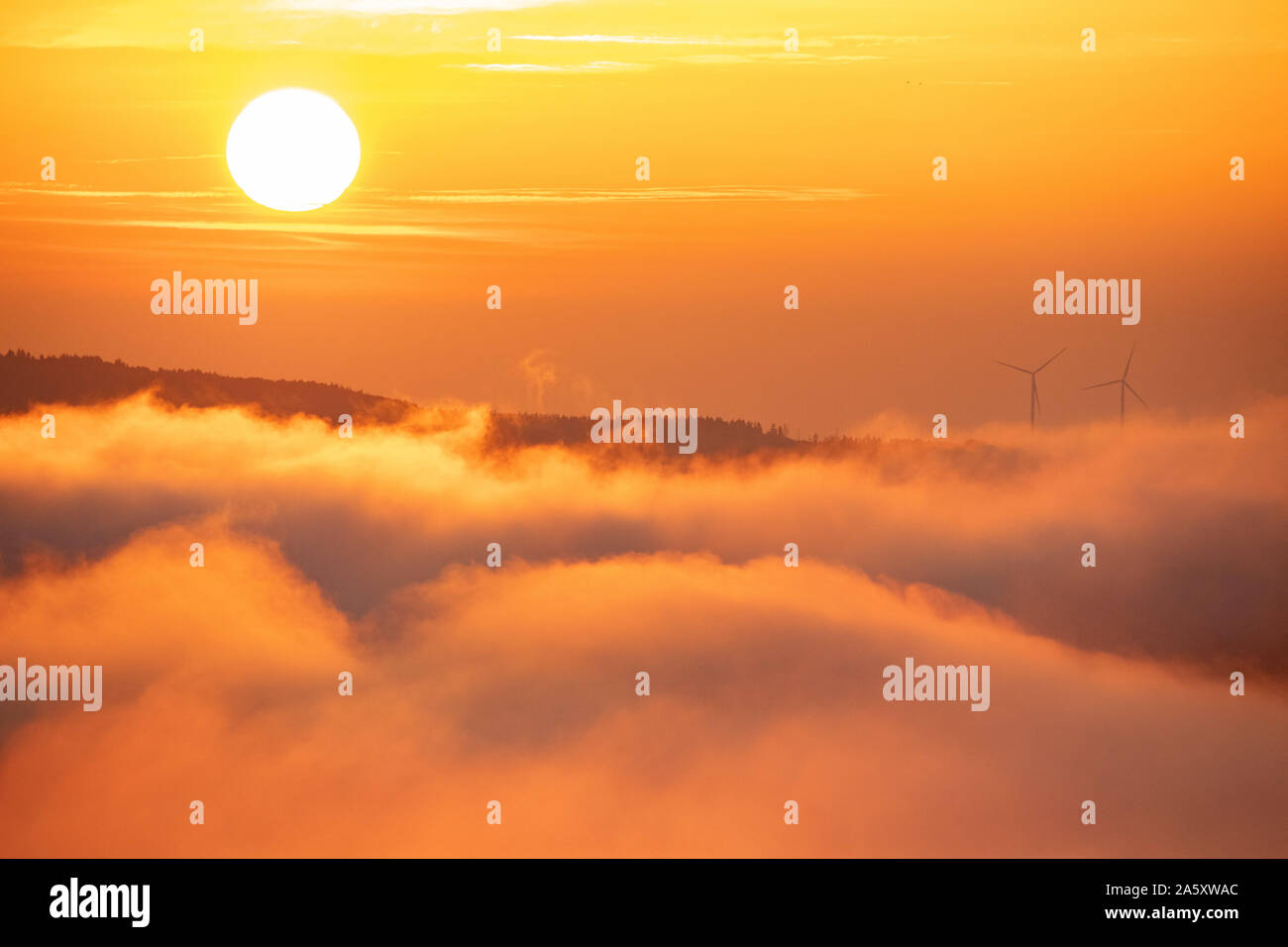 Simmerath, Germany. 23rd Oct, 2019. The sun rises in Rurberg, a ...