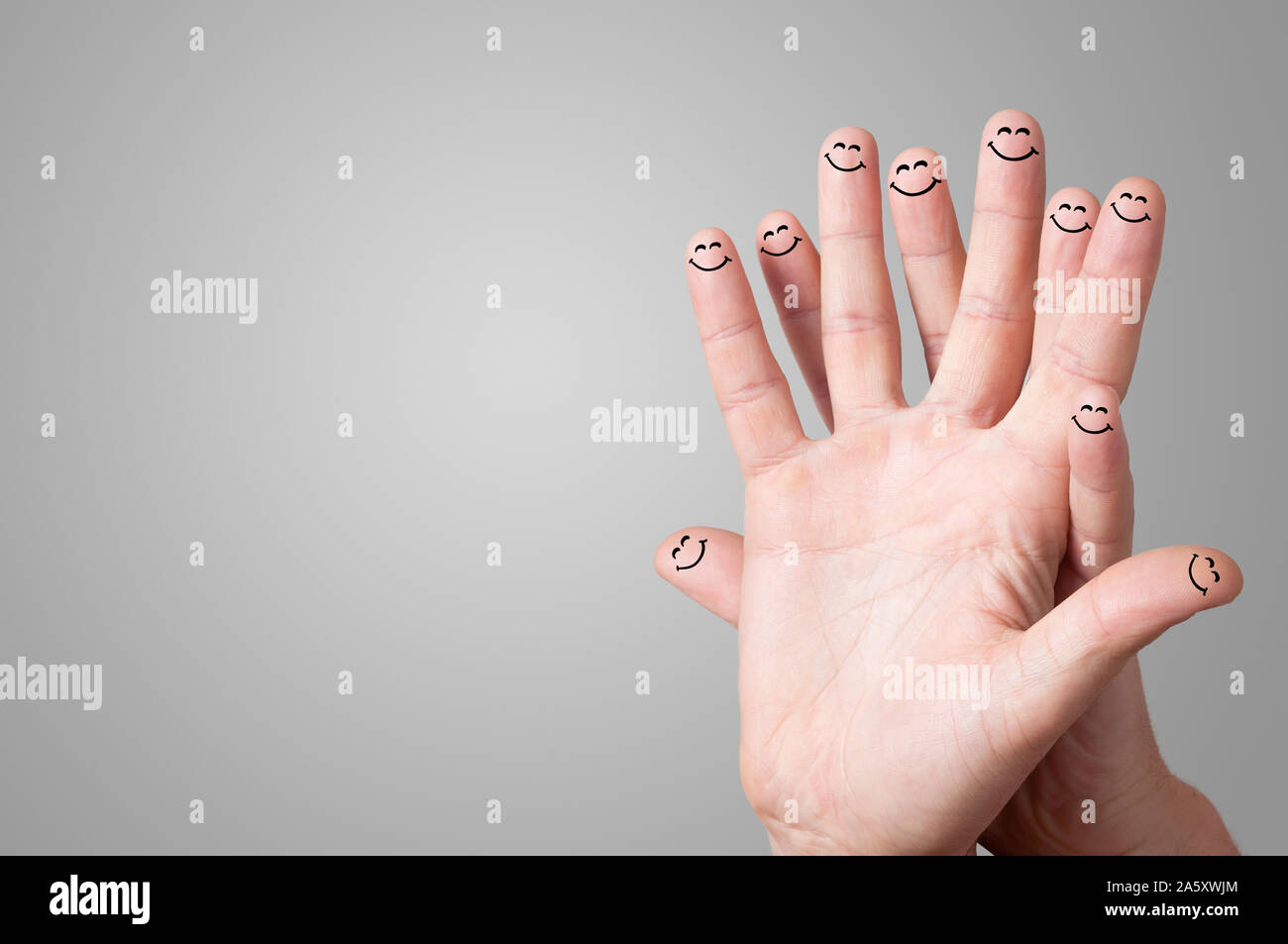 Happy face fingers hugs each other Stock Photo - Alamy