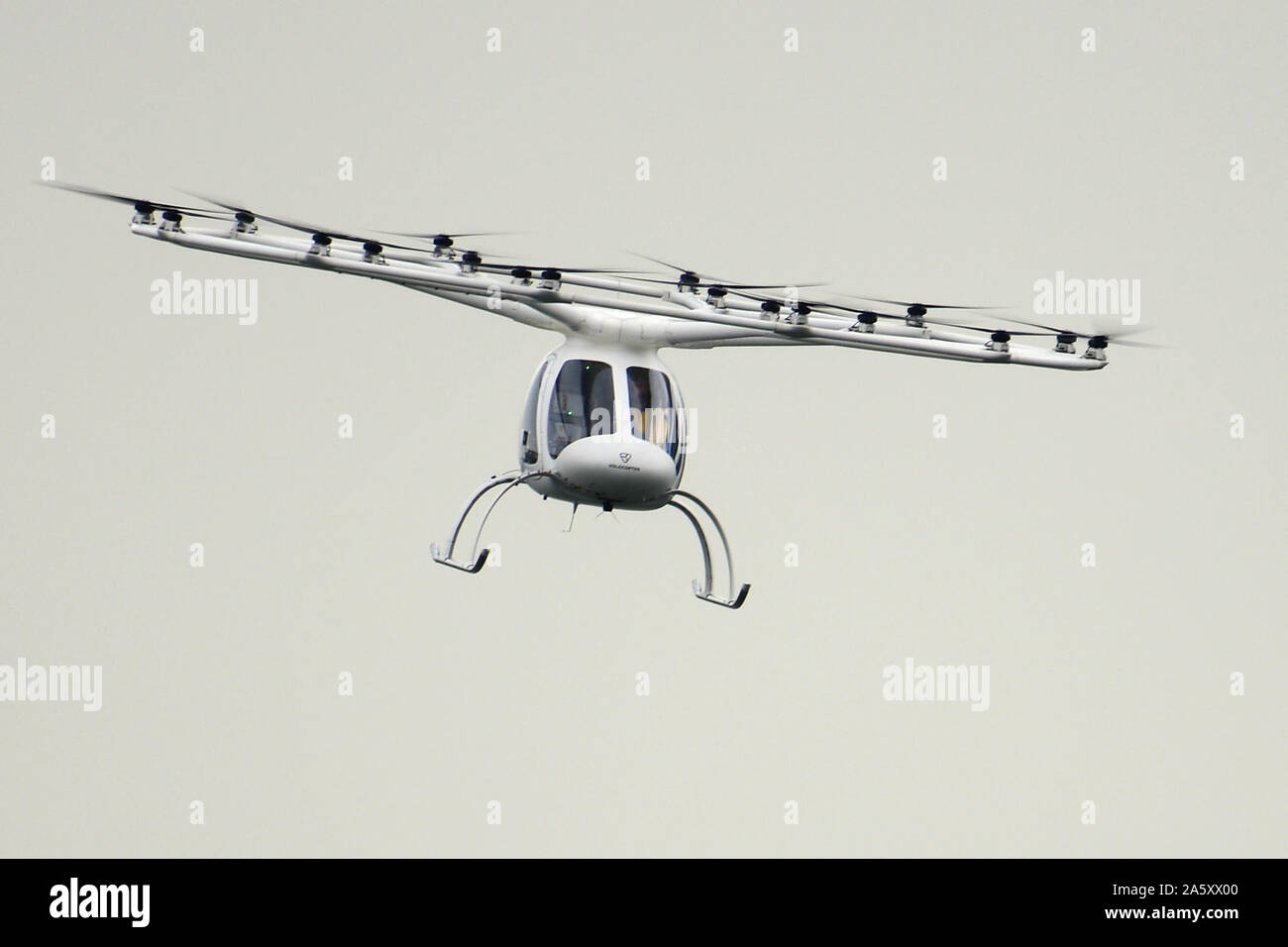Beijing, China. 22nd Oct, 2019. A Volocopter air taxi flies over Marina ...