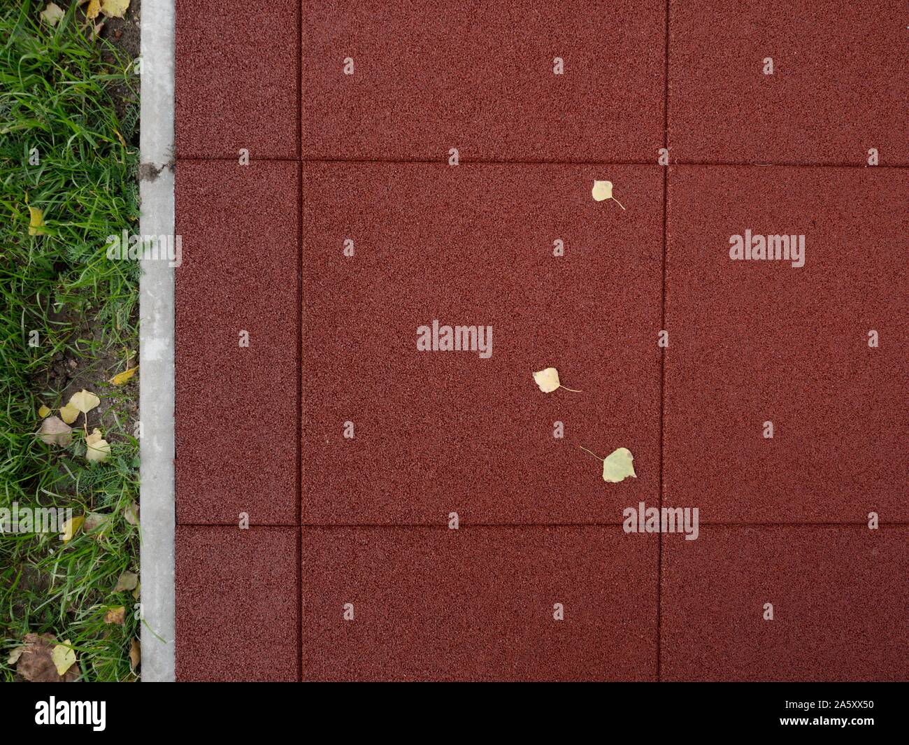 Texture of red rubber floor used for safety kids playground. Red Rubber ...