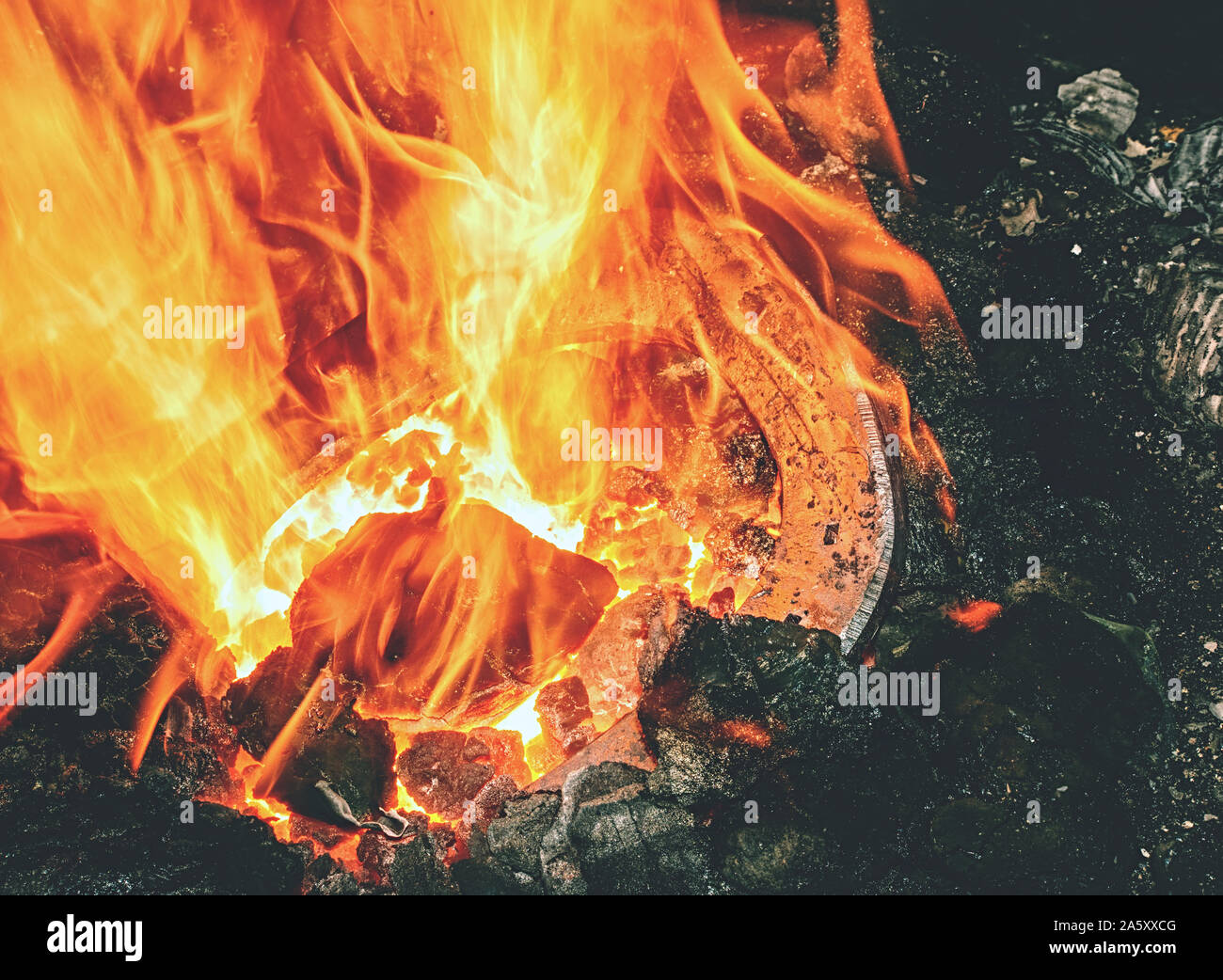 Smith furnace. Hot metal handmade unique iron rose in forge stove Stock ...