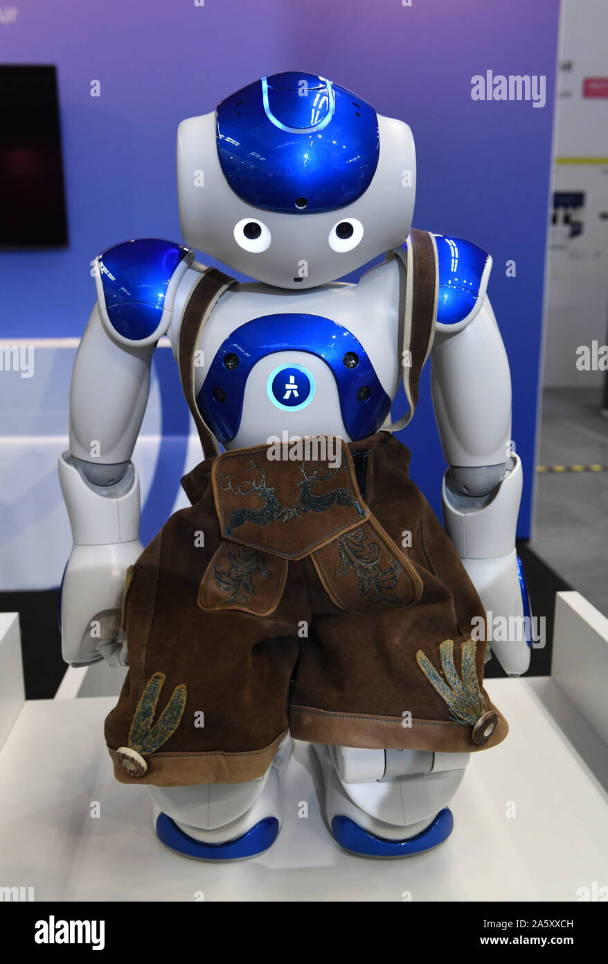 Munich, Germany. 23rd Oct, 2019. A robot figure in leather trousers ...