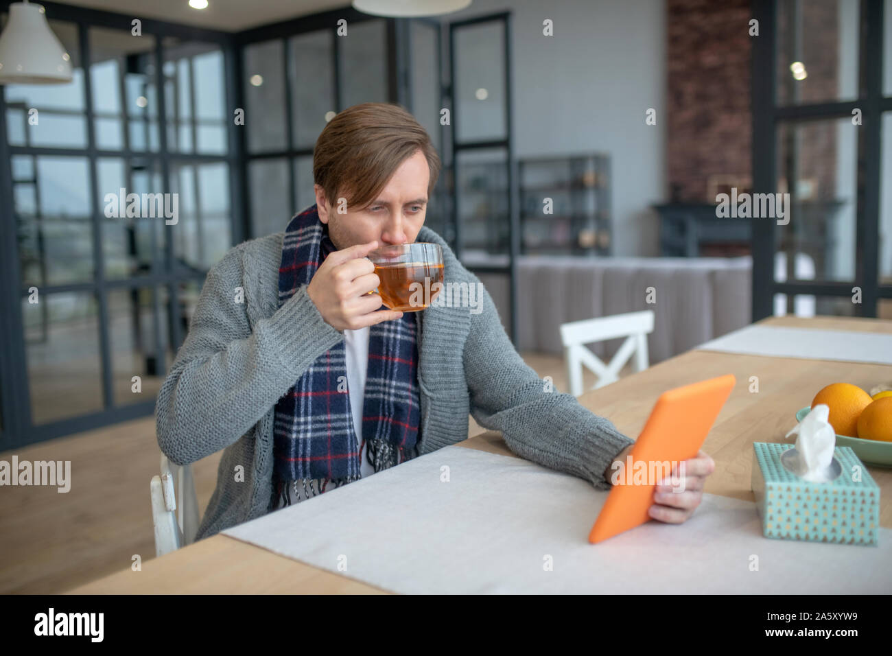 Businessman having sick leave drinking tea in the morning Stock Photo ...