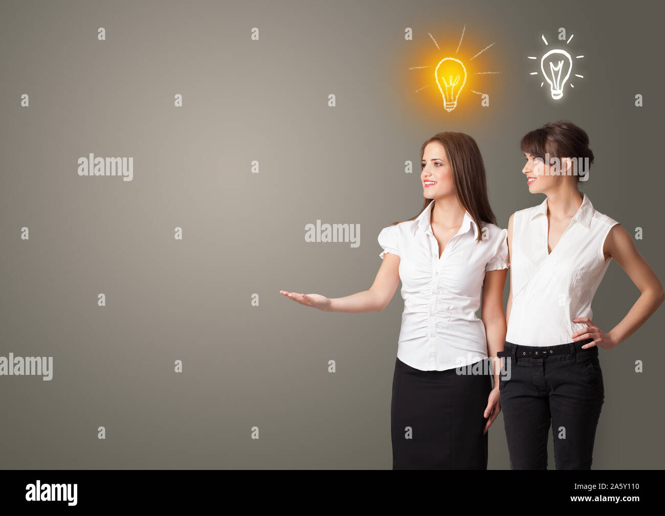 Young smiling person presenting new idea concept Stock Photo - Alamy