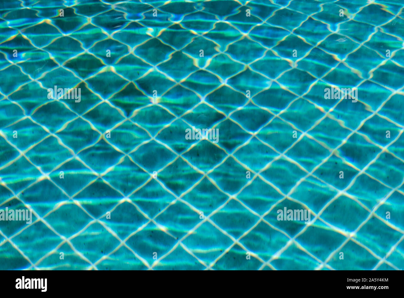Blue swimming pool water texture reflection lighting Stock Photo - Alamy
