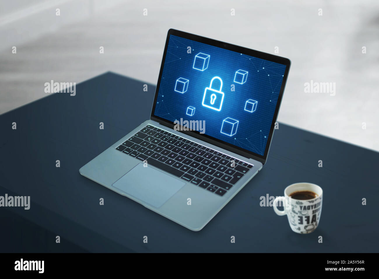 Laptop with blockchain security concept icons. Clean scene of work desk ...