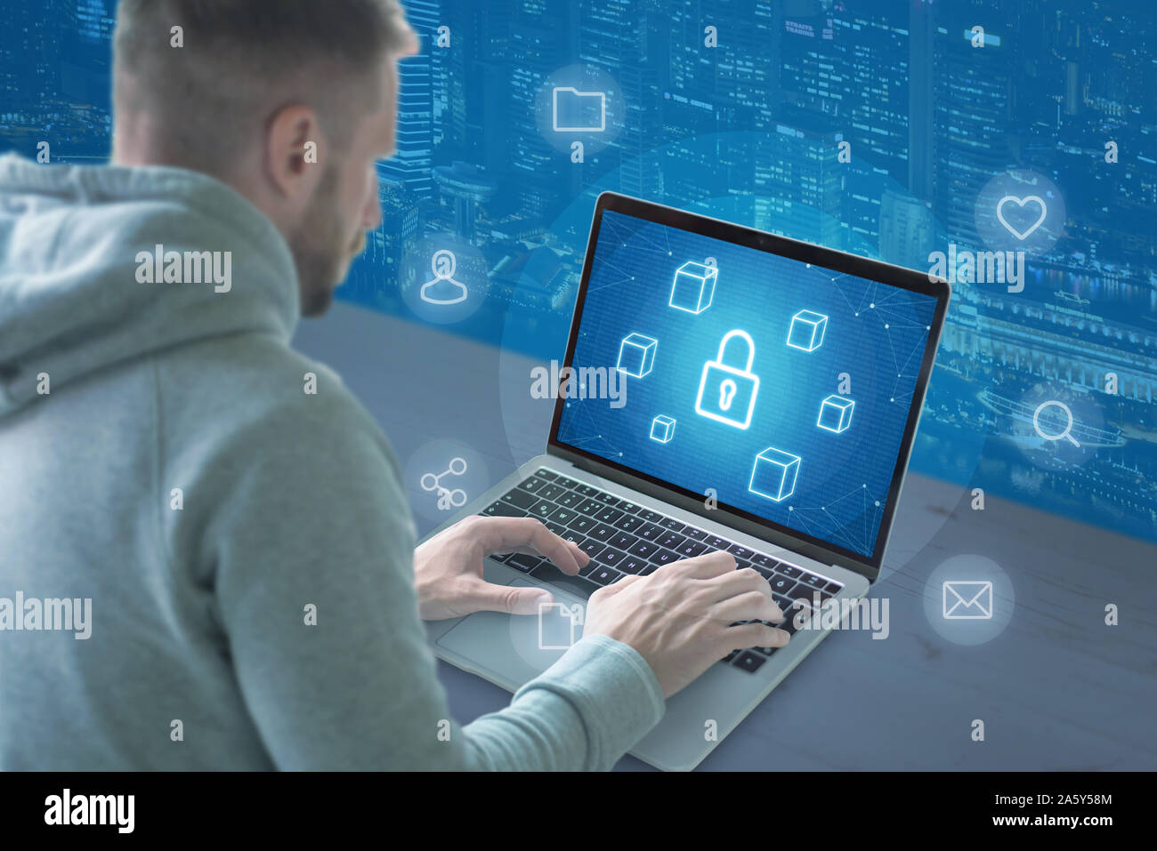 Concept of online security. Guy work on computer with conceptual icons ...