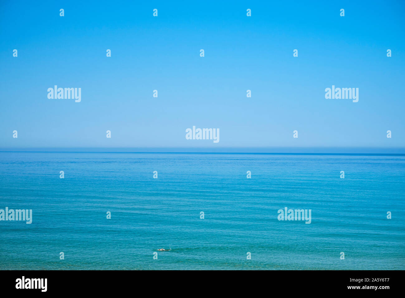 Distant swimming figure hi-res stock photography and images - Alamy