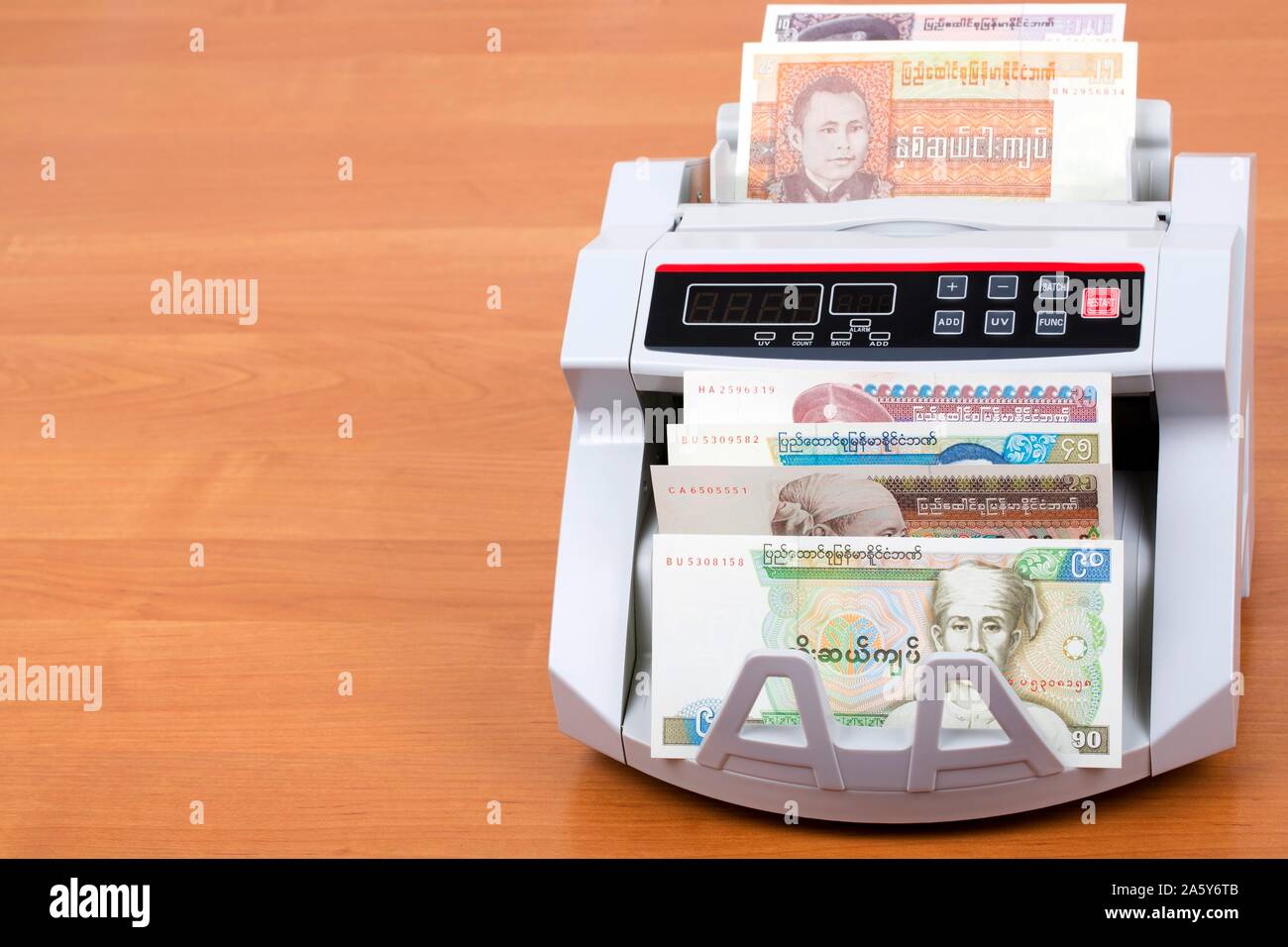 Counting burmese kyats hi-res stock photography and images - Alamy