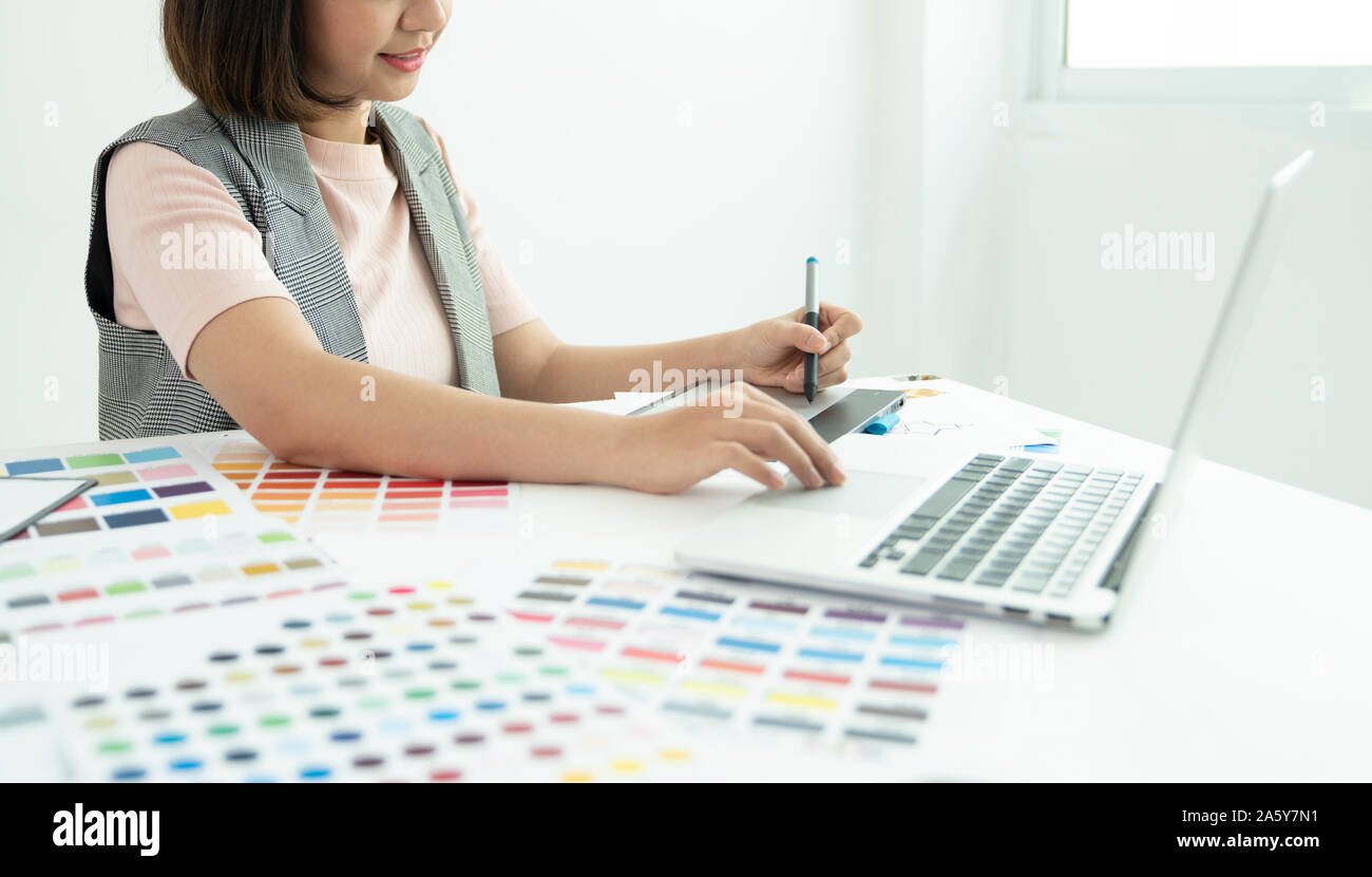 Graphic designer at work. Color swatch samples. Artist drawing ...