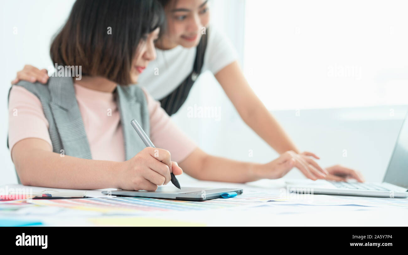 Coworking process. Designers team working modern office. Young creative ...