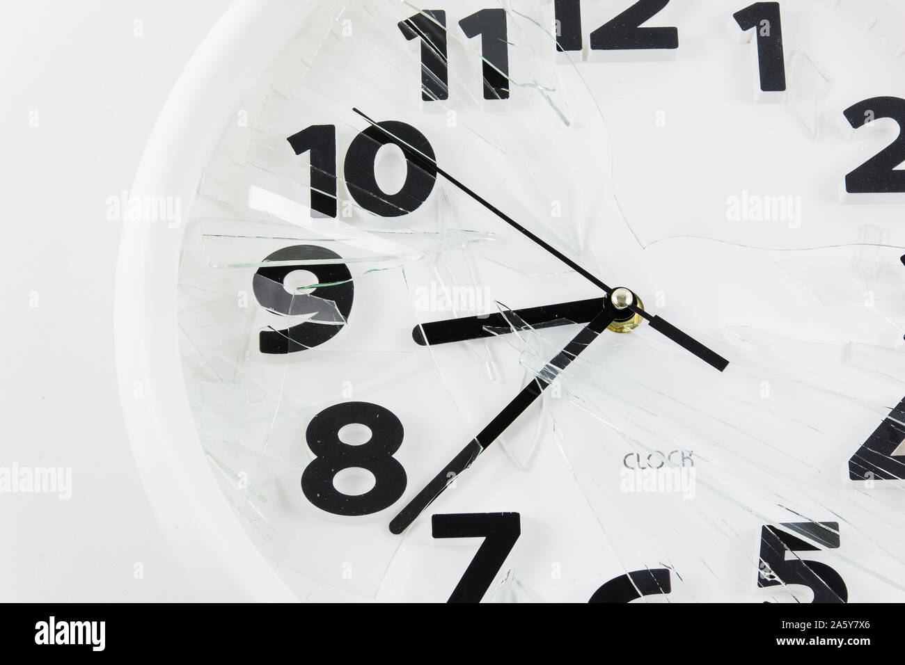White clock is broken glass isolated on white background Stock Photo ...