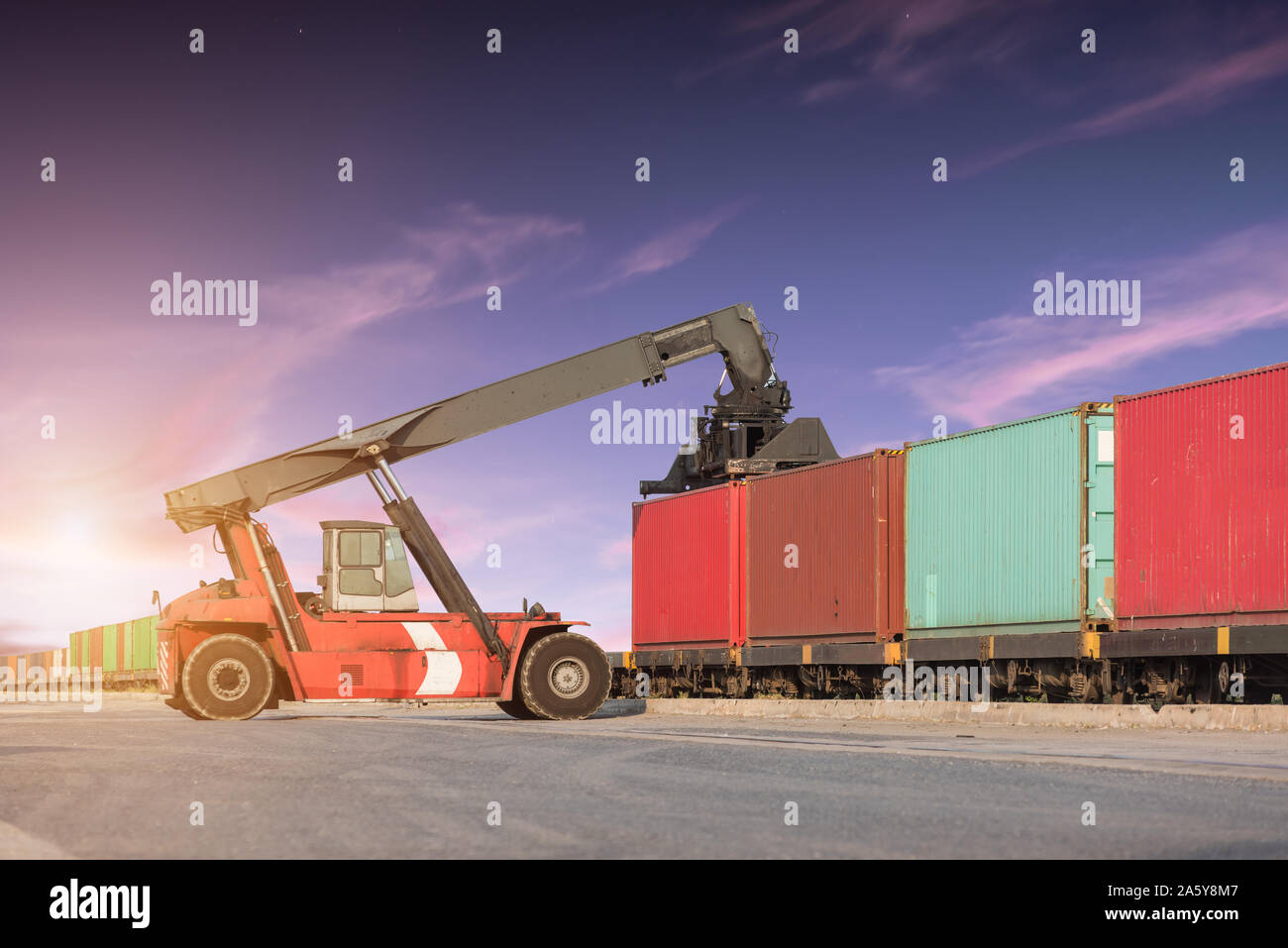 Forklift handling container box loading at the Docks with Truck Stock ...