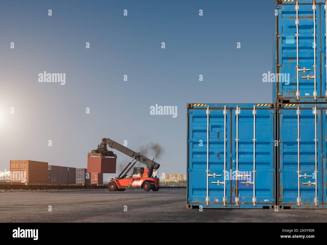 forklift handling container box loading from dock to truck Stock Photo ...