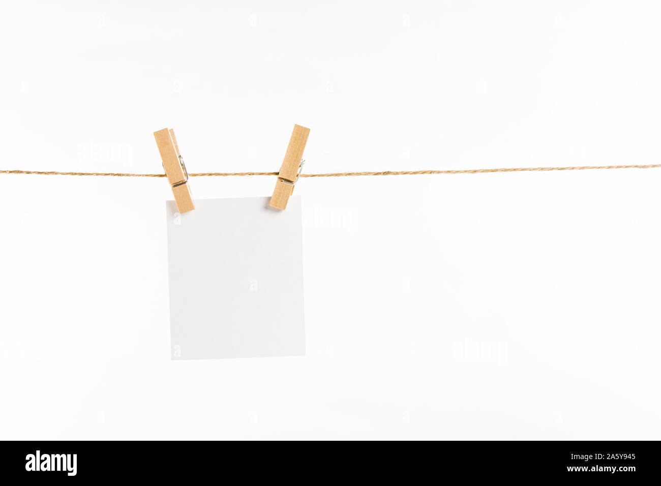 paper cards hanging rope isolated on white background Stock Photo - Alamy