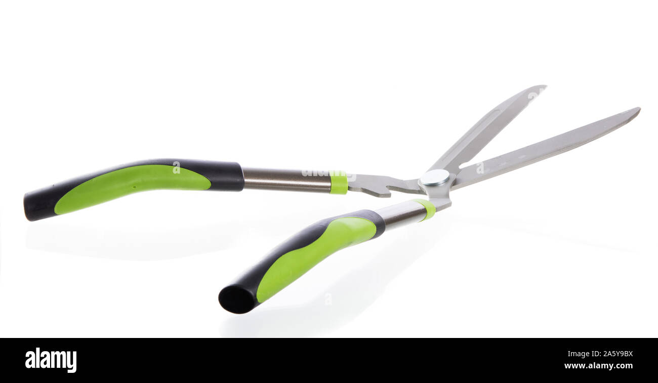 Scissors to cut grass isolated on over white background Stock Photo - Alamy