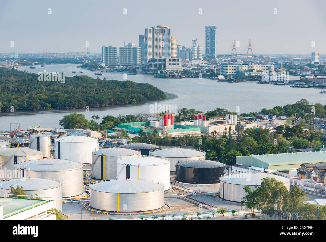Refinery factory Oil tanks, petroleum at day Stock Photo - Alamy