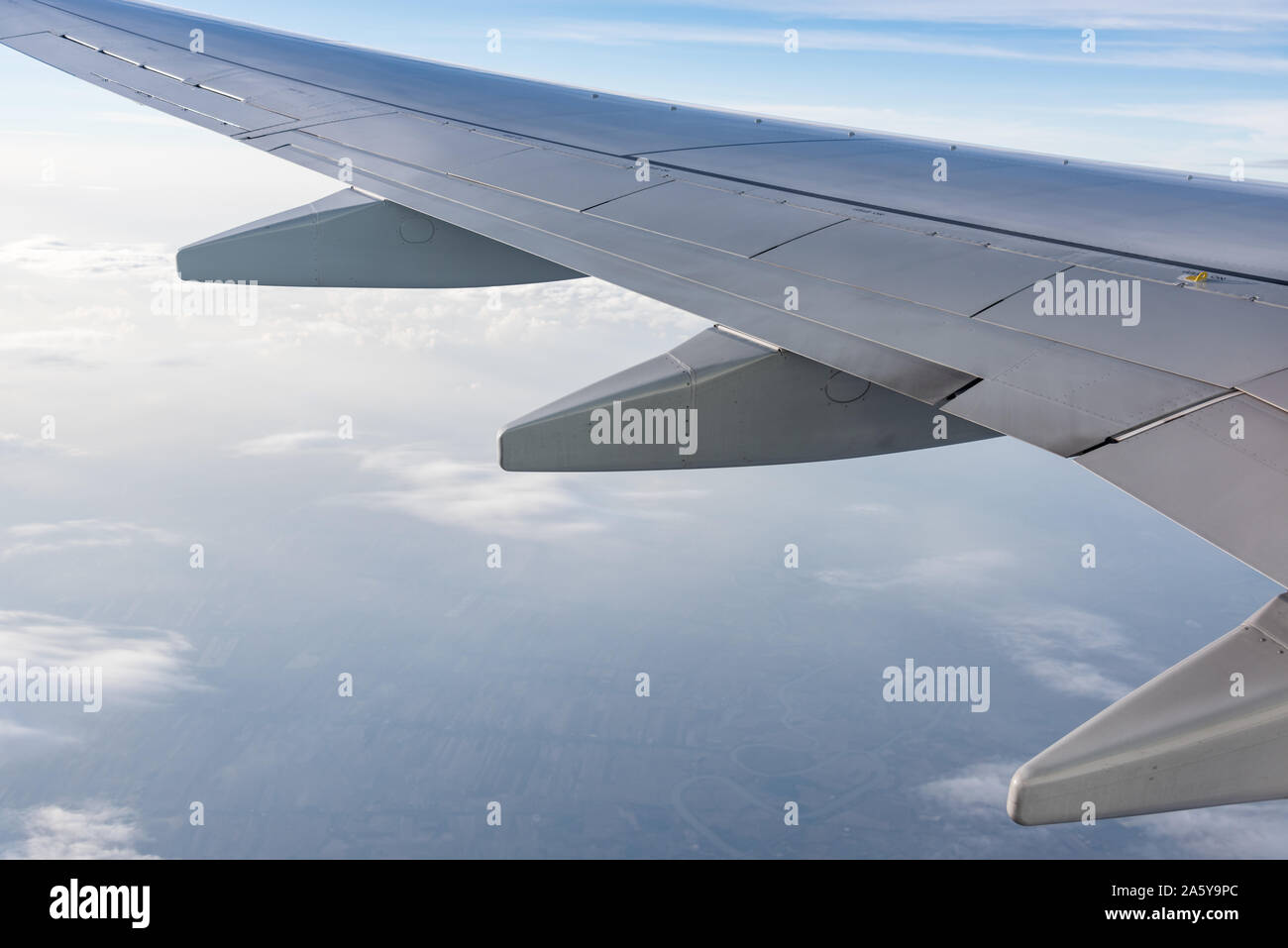 Wing aircraft at cloud sunset view from plane Stock Photo - Alamy