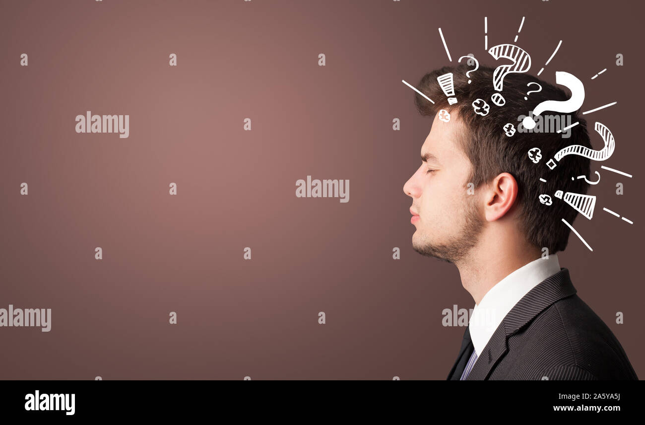 Head with white question marks, and copy space Stock Photo - Alamy