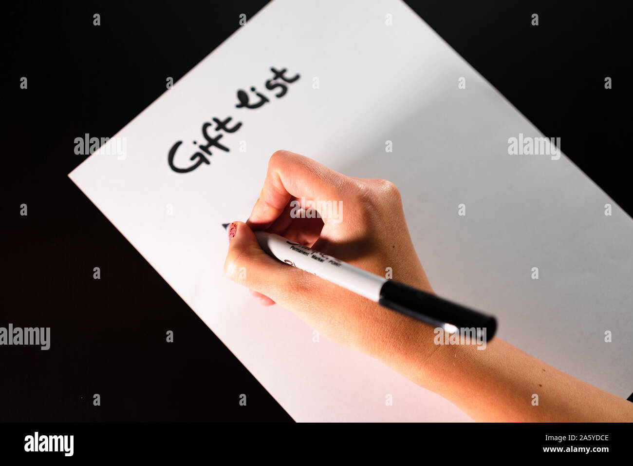 Writing Gift list for Christmas. Christmas Gift list. Text Gift list on ...