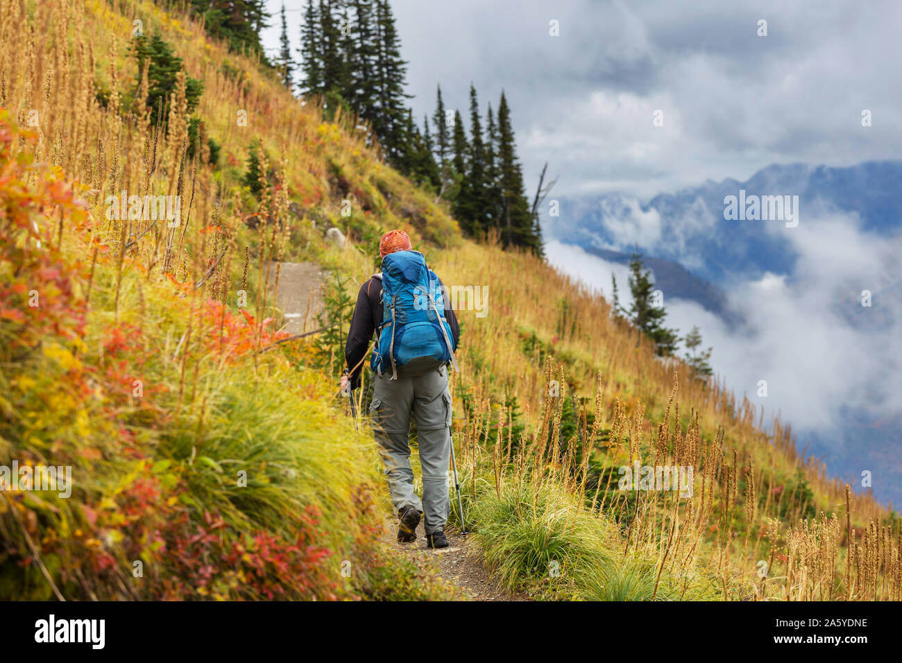 Hike in the autumn mountains. Fall season theme Stock Photo - Alamy