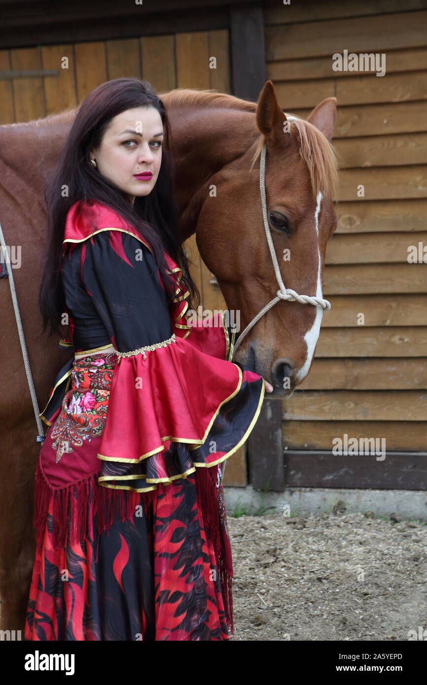 Beautiful gypsy girl riding horse hi-res stock photography and images ...