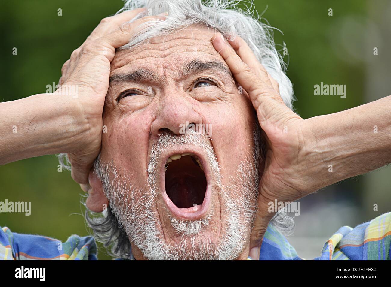An Anxious Latino Person Stock Photo - Alamy