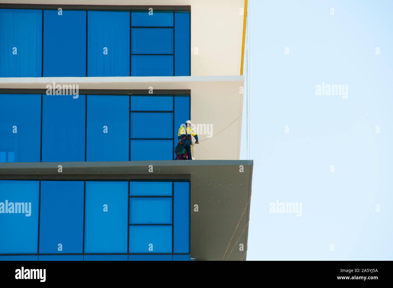 Windows Cleaning on City Building Stock Photo - Alamy