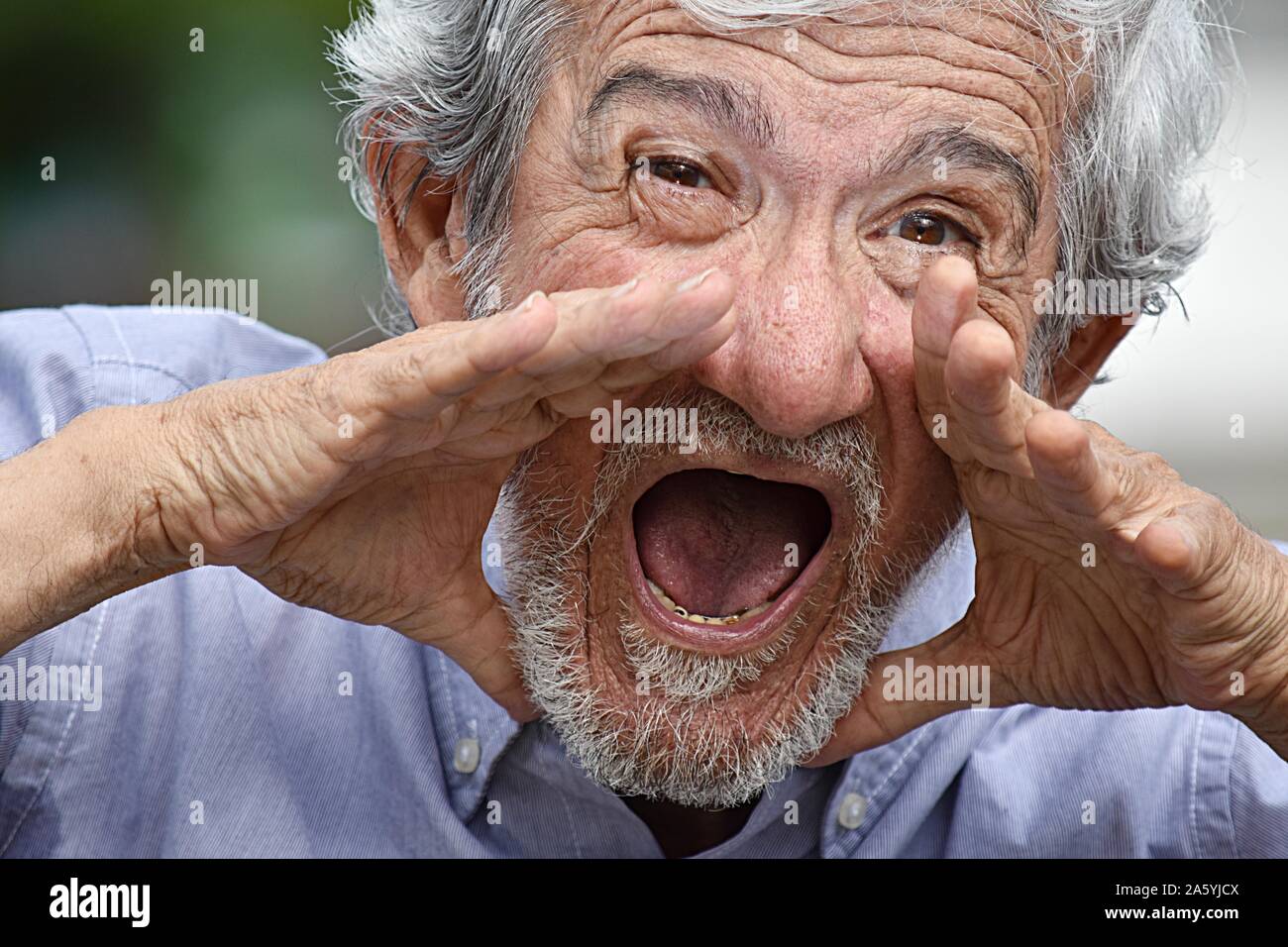 Male shouting loudly hi-res stock photography and images - Alamy
